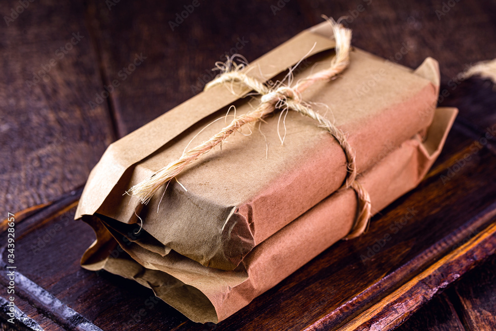 Sweet made with sugar cane, molasses or brown sugar. Packed on paper ...