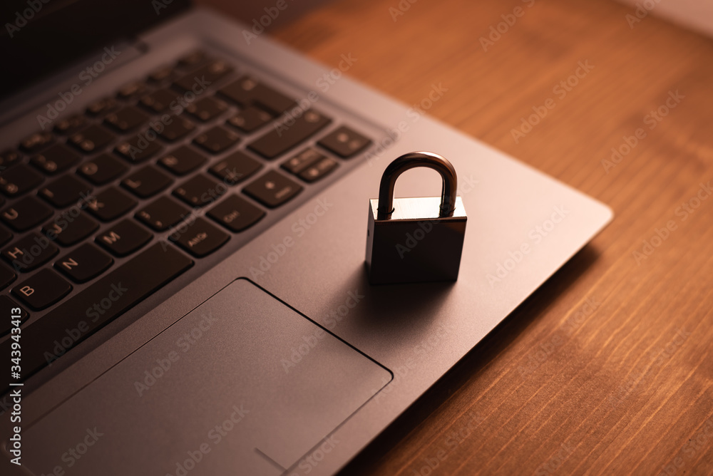 Technology and digital device and security hacking concept with a lock ...