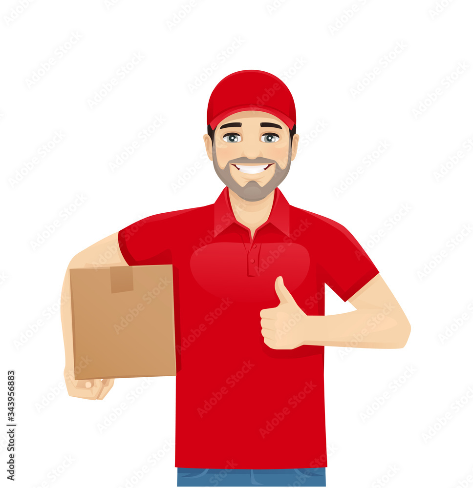 Handsome delivery man in red uniform showing thumb up with box isolated ...