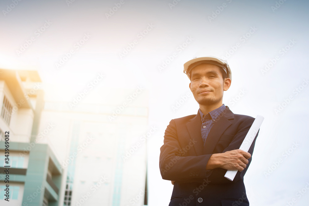 Engineer holding blueprint planing project Stock Photo | Adobe Stock