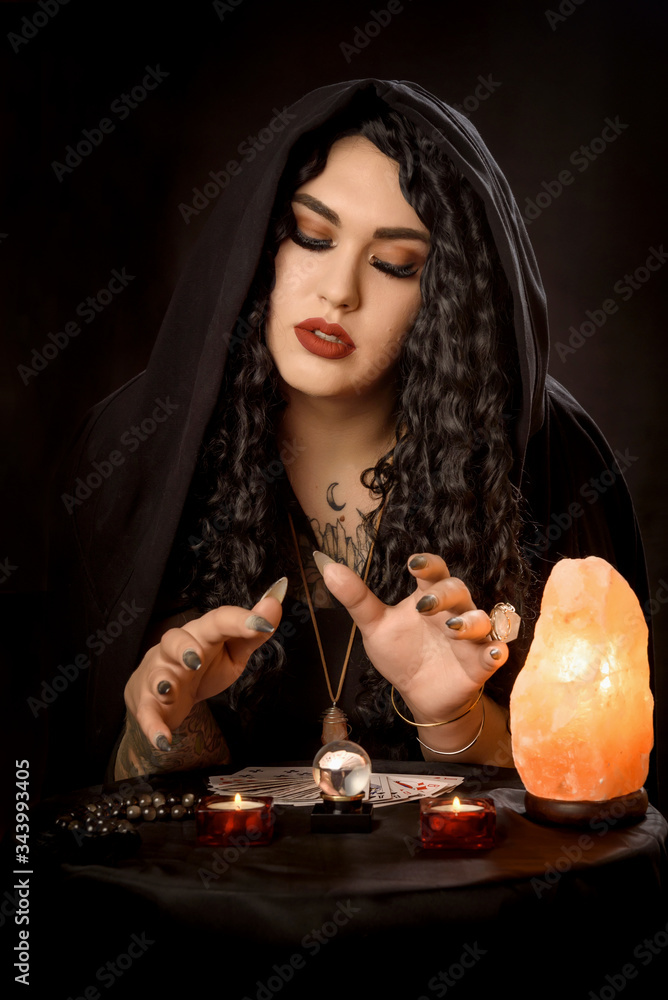 Girl gypsy fortune teller in a hooded cloak with a red handkerchief at ...