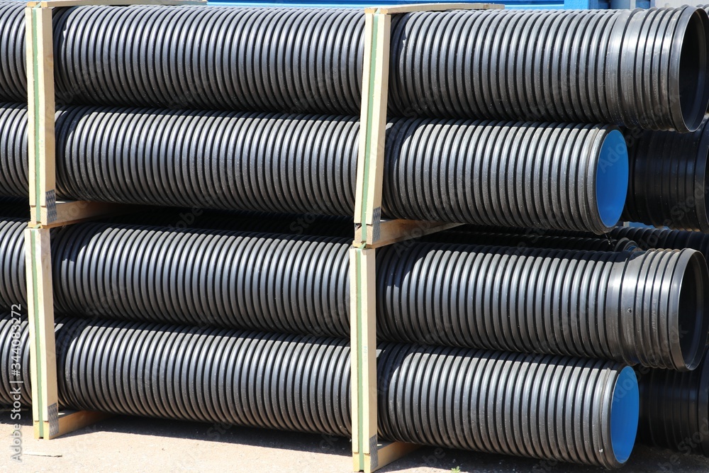 PVC pipes on the warehouse. Drainage system pipes.Selective focus Stock ...
