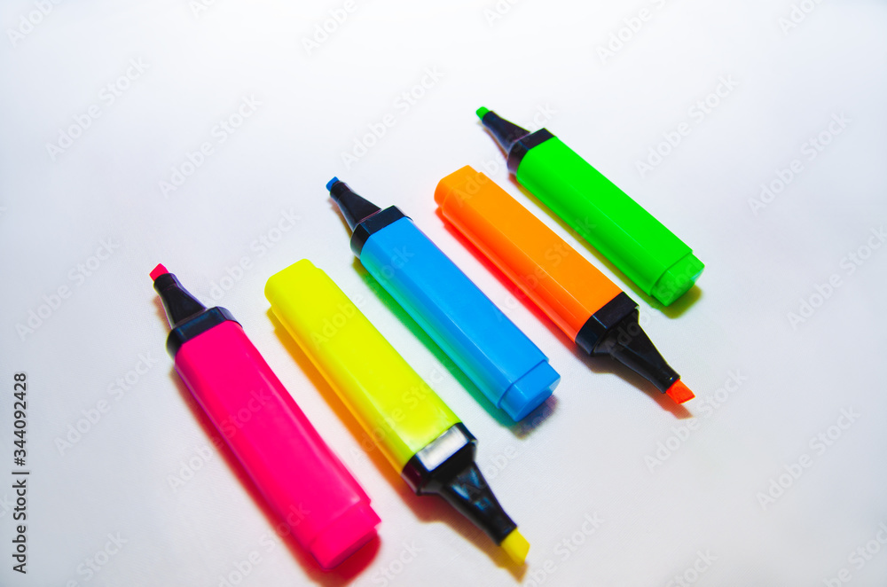 Colorful markers on white background, a lot of colored markers on white ...