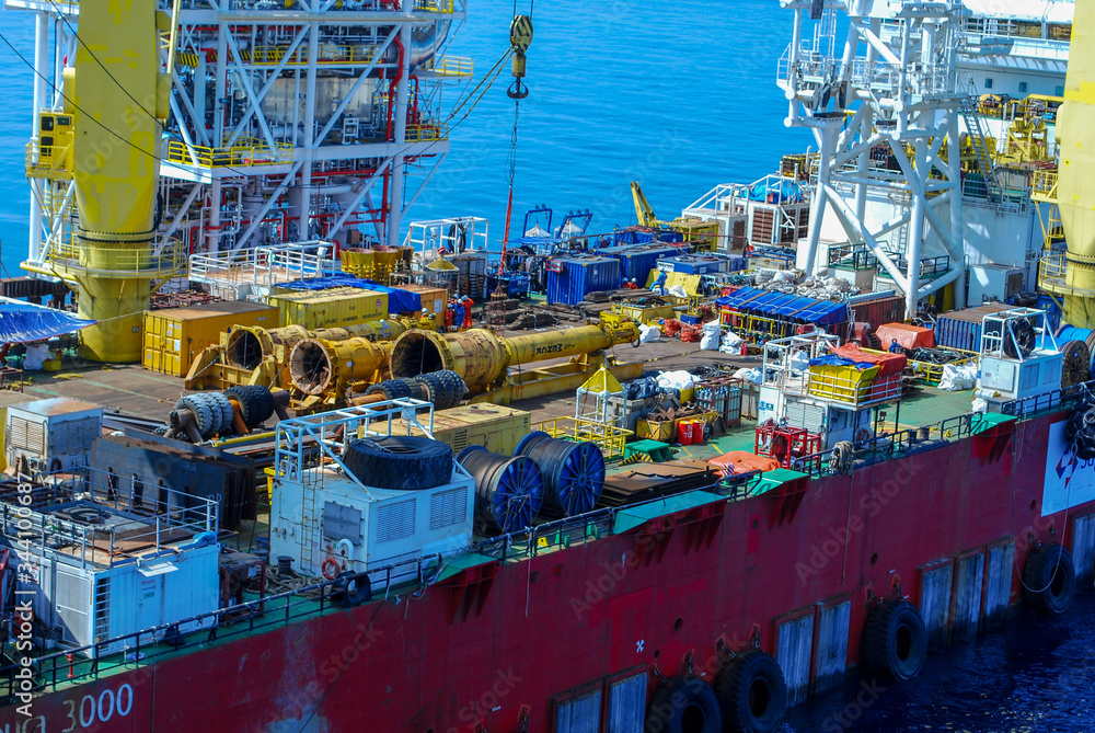 Large work barge carrying new structure module to be installed at oil ...