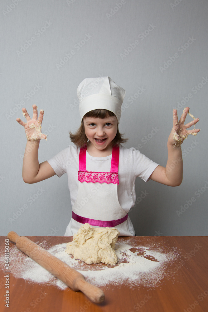 Angry girl cook shows emotions Stock Photo | Adobe Stock