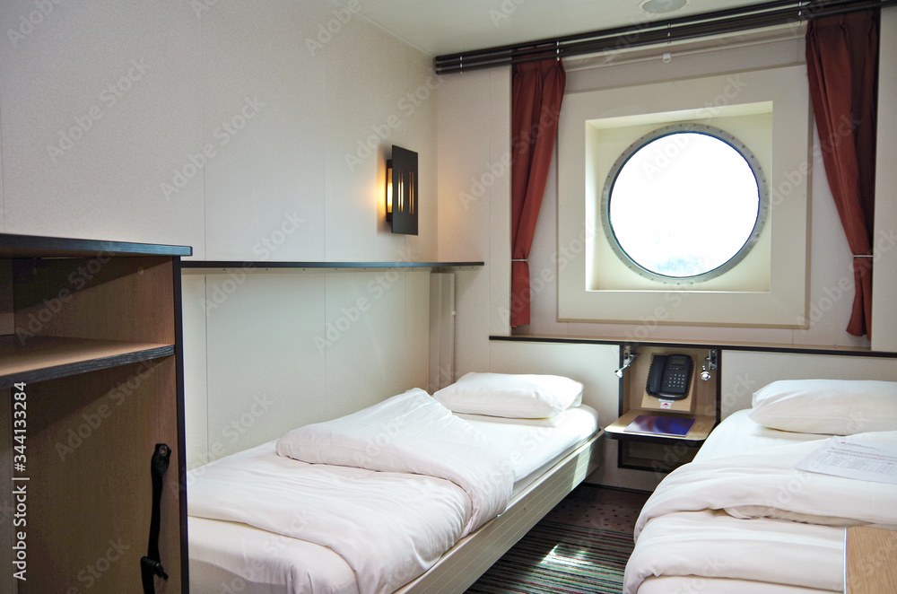 Oceanview cabin or exterior or outside stateroom with two single beds ...