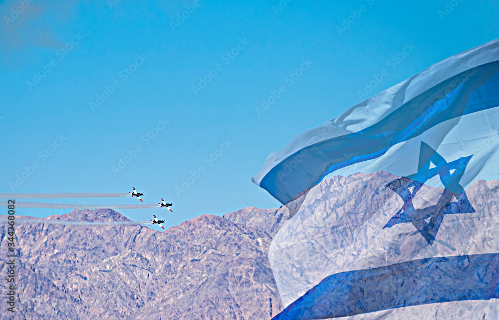 Streaming Israeli Flag and Air Acrobatic flight reciprocating aircraft ...