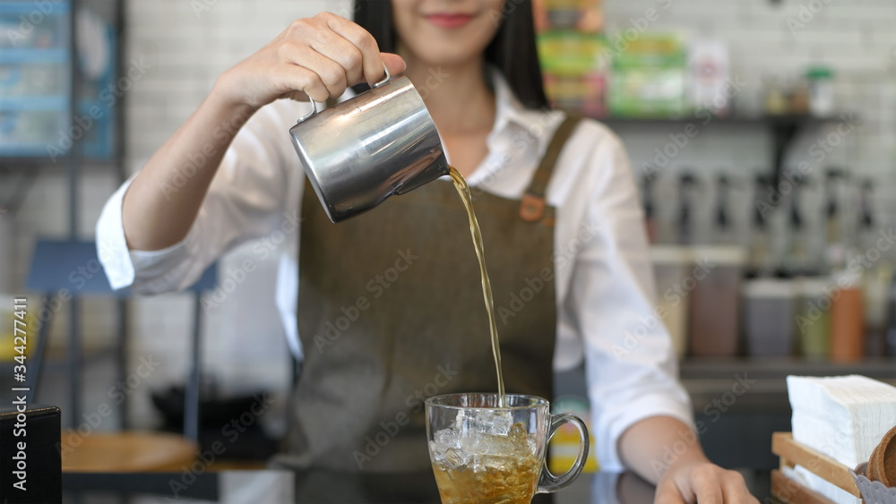 Barista concept. Woman making tea at a bar in a coffee shop. 4k ...
