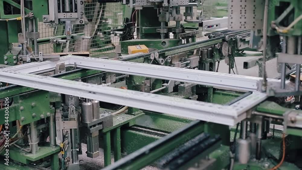 Cleaning of welds on plastic window. Factory for PVC windows and doors ...