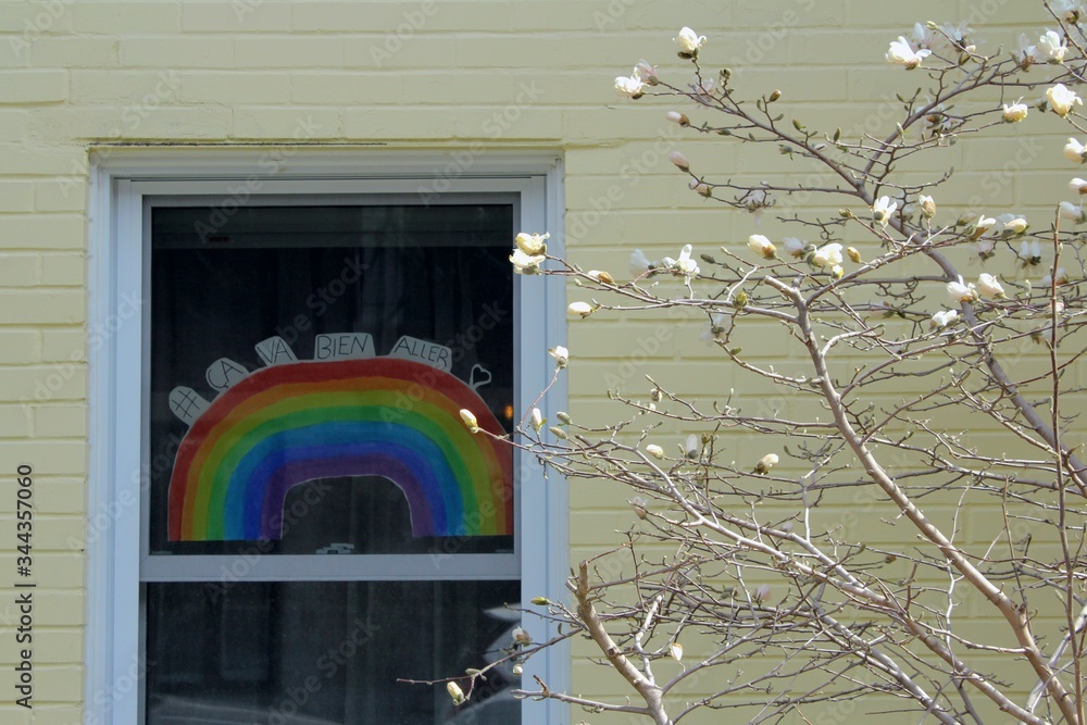 "Everything Will Be All Right" rainbow drawing in window, hope symbol ...