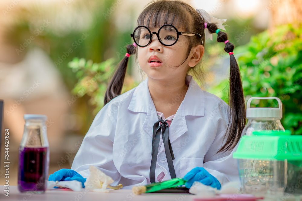 Close up view For a cute girl, a concept learning science process ...