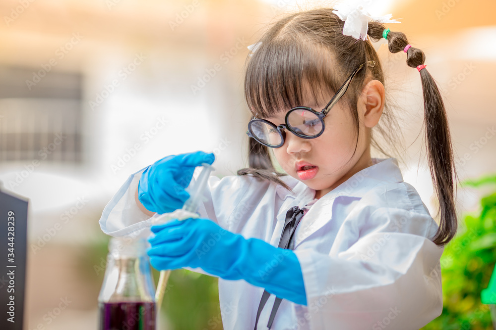 Close up view For a cute girl, a concept learning science process ...