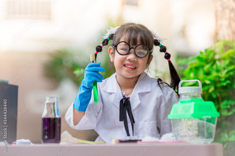 Close up view For a cute girl, a concept learning science process ...