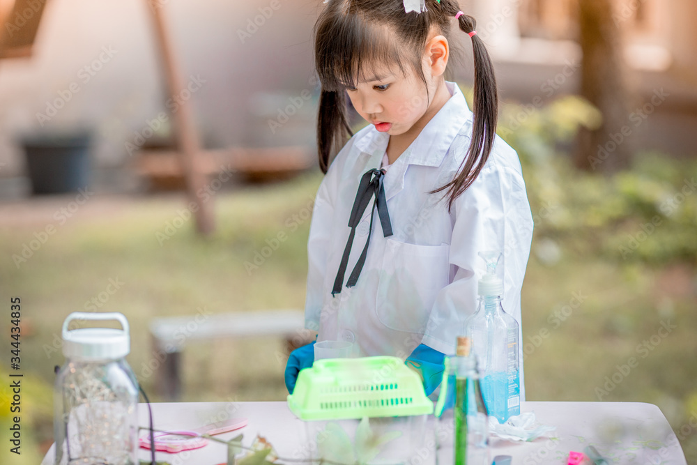 Close up view For a cute girl, a concept learning science process ...