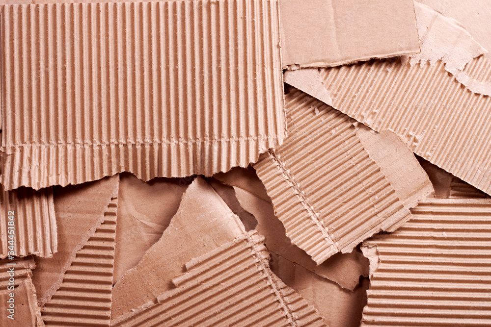 Pieces of a torn cardboard box. Background image. Paper recycling ...