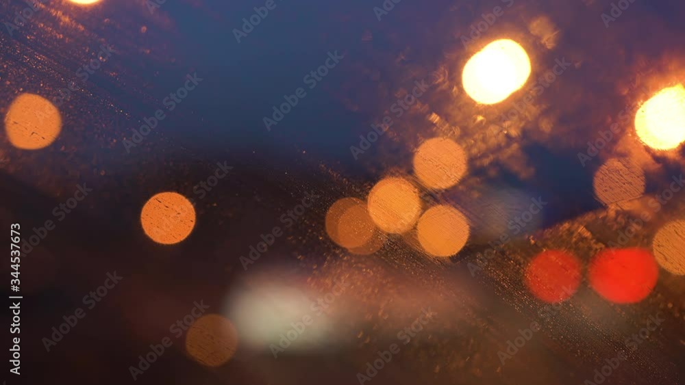 Stockvideo Janitors wipe water rain windshield. Rainy weather hurricane ...