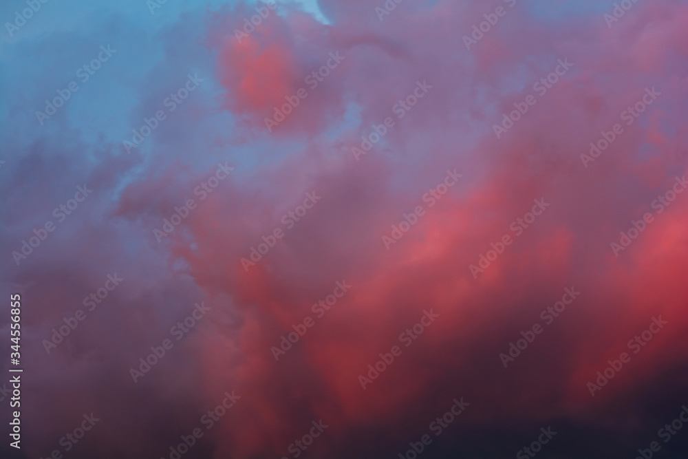 Dramatic sky with bright red and dark blue stormy clouds. Nature ...