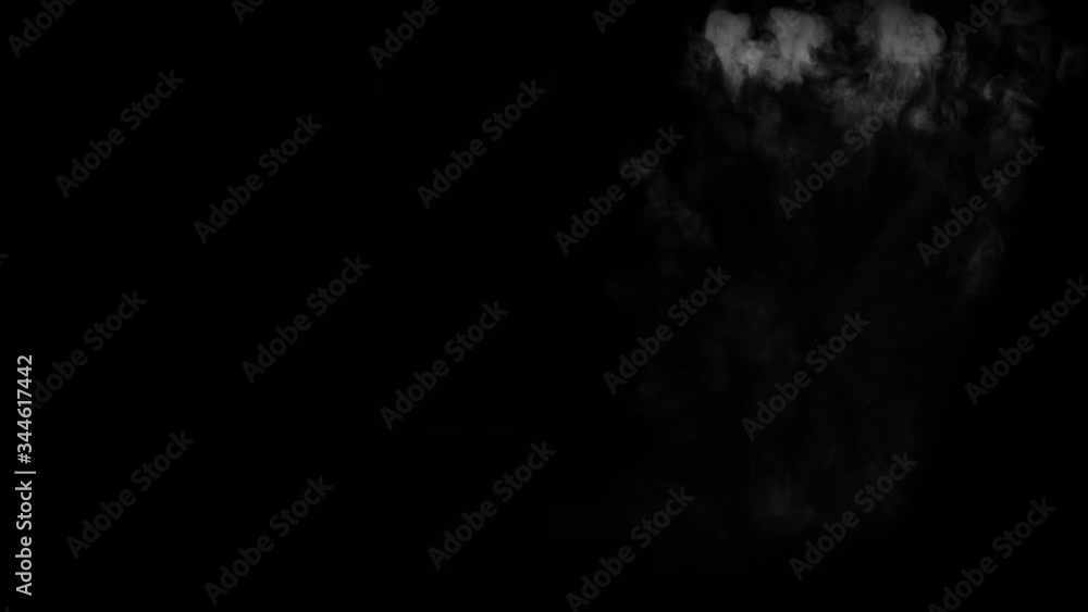 Dusty bullet hits on a wall with chunks of debris flying out . Powder ...