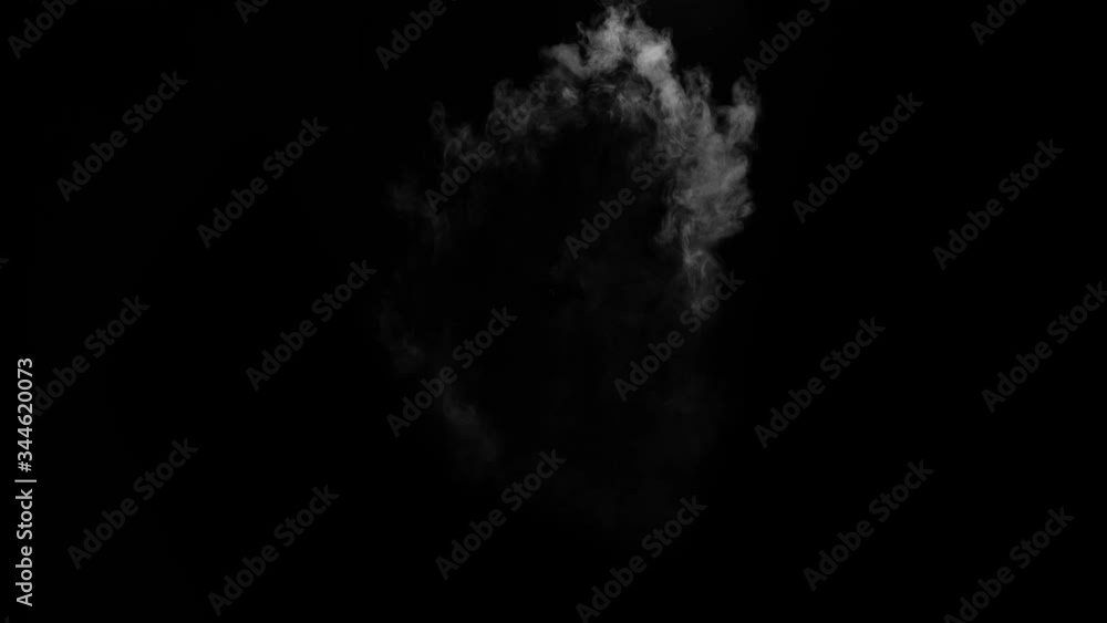 Dusty bullet hits on a wall with chunks of debris flying out . Powder ...