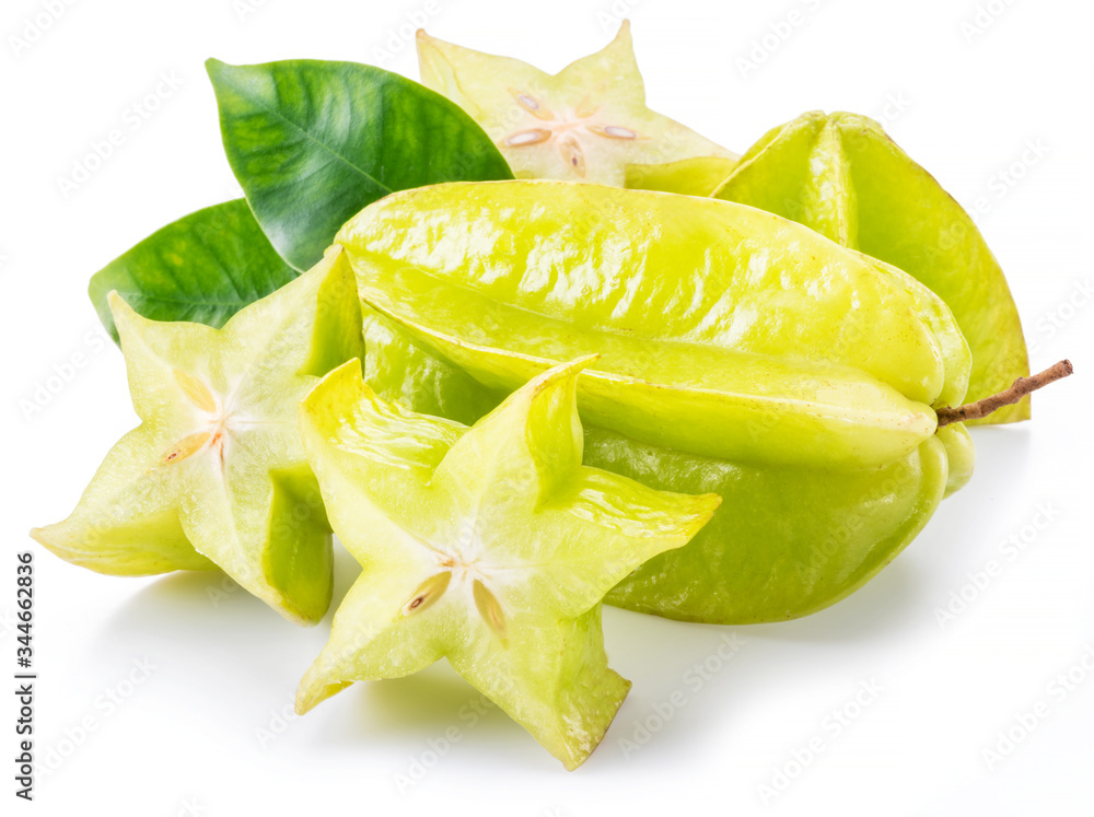 Carambola fruit with slice of star fruit and leaves isolated on a white ...