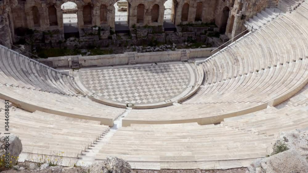 Tilt up over remaining of the Odeon of Herodes Atticus stone Roman ...