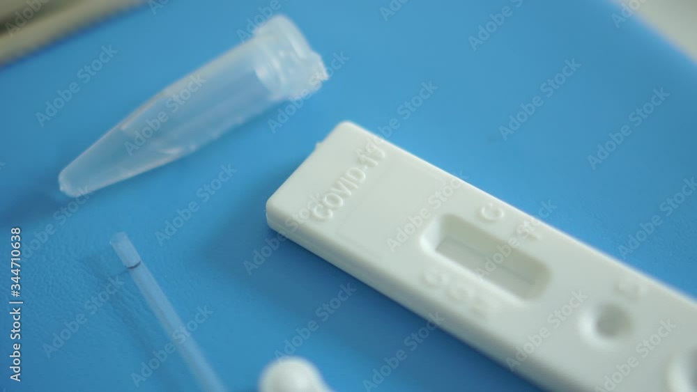 Unpacked set of rapid test Covid-19 lies on the table of the ...