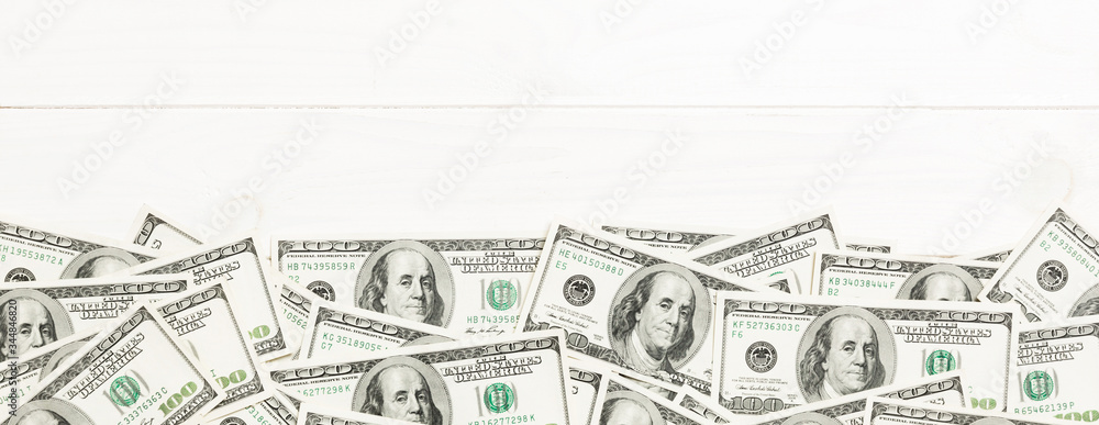 Top view banknotes on colored desk with copy space on top. one hundred ...