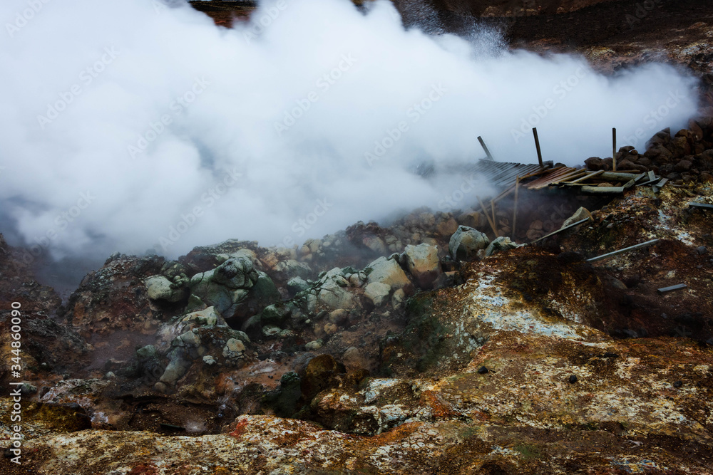 Steam rises from hot springs in a geothermal area of Iceland. Stock ...