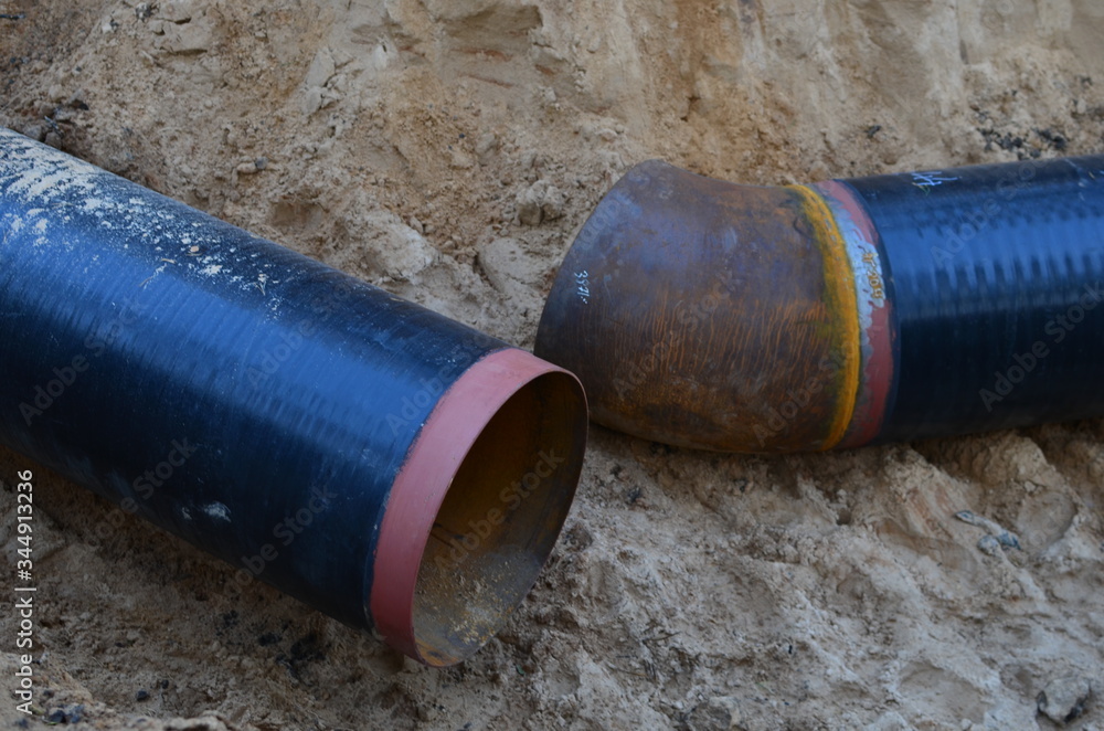 Natural gas pipeline construction work. A dug trench in the ground for ...