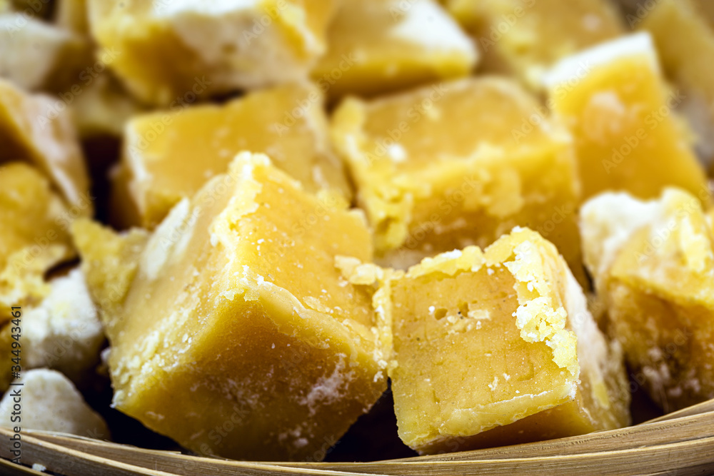 straw basket with sugar cane-based sweets of Azorean or Canarian origin ...