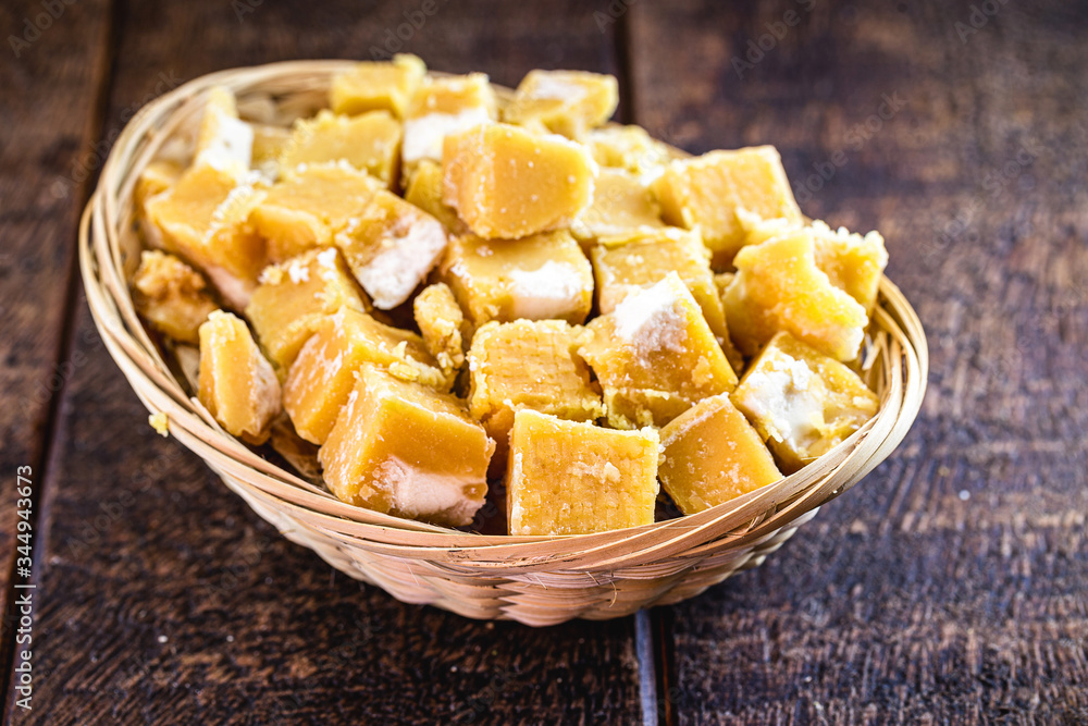 straw basket with sugar cane-based sweets of Azorean or Canarian origin ...
