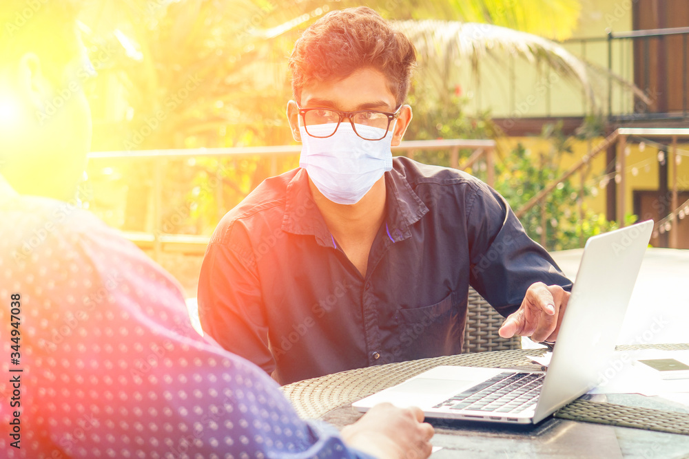 indian businessman coach leader with multiracial business partner ...