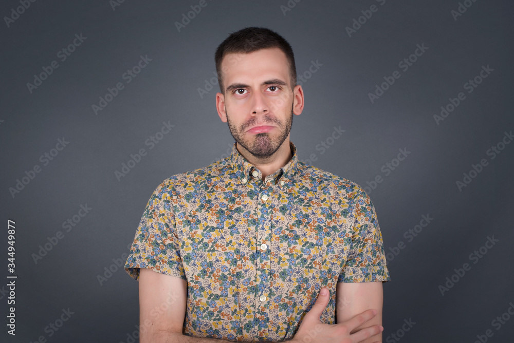 Beautiful face of sad man crying desperate and depressed with tears on ...