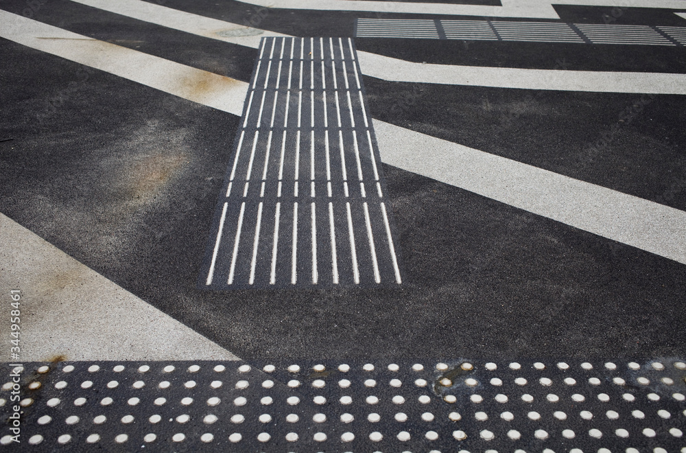 lines on asphalt road with markings for blind people Stock Photo ...