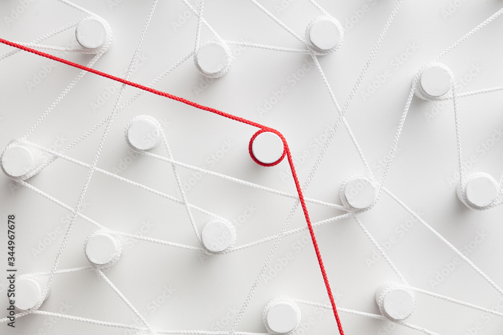 Isolated red thread among white threads Stock Photo | Adobe Stock