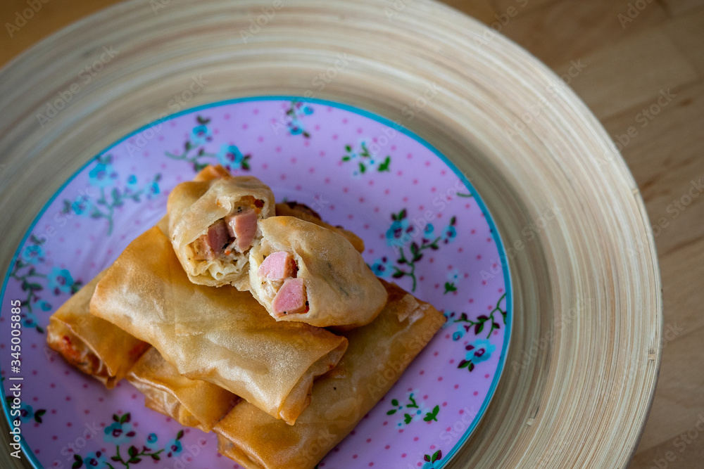 Fried carbonara popiah spring roll, a crunchy snack popular in ...