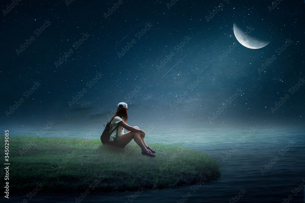 Girl Sitting Alone In Moonlight