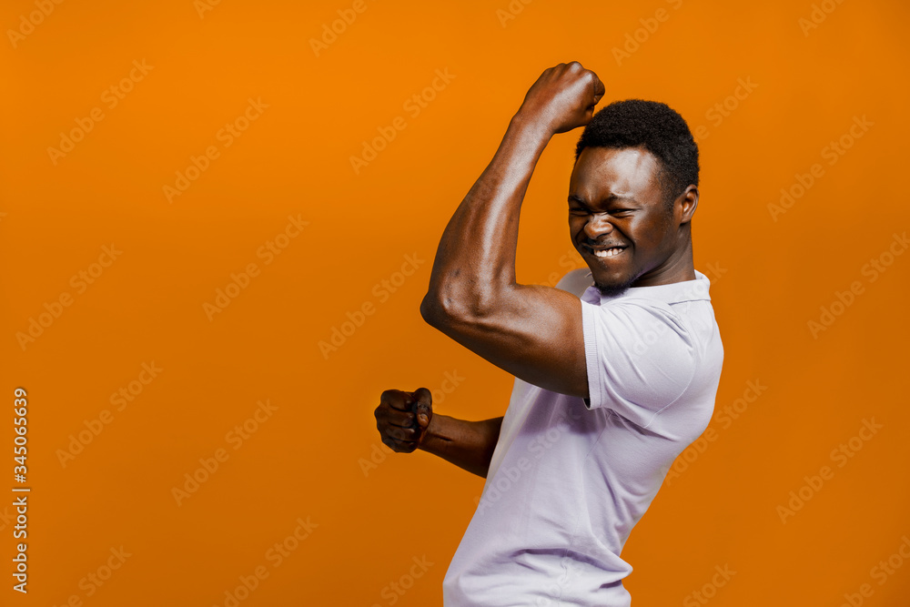 Happy black man turns his hands up and shouts loud because carantine ...