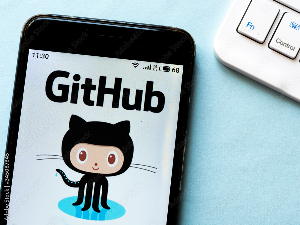 In this photo illustration GitHub logo is seen displayed on a ...
