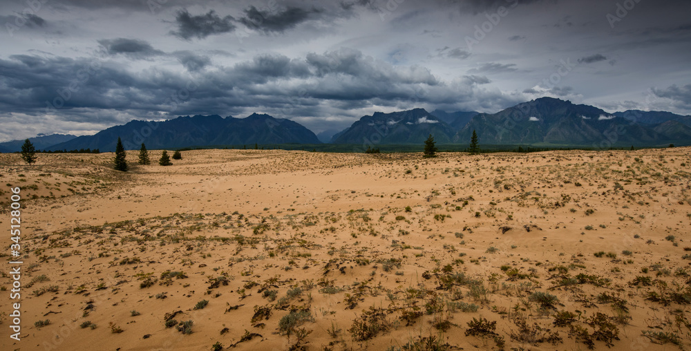 Chara sands and mountains Kodar ridge in Transbaikalia of Eastern ...