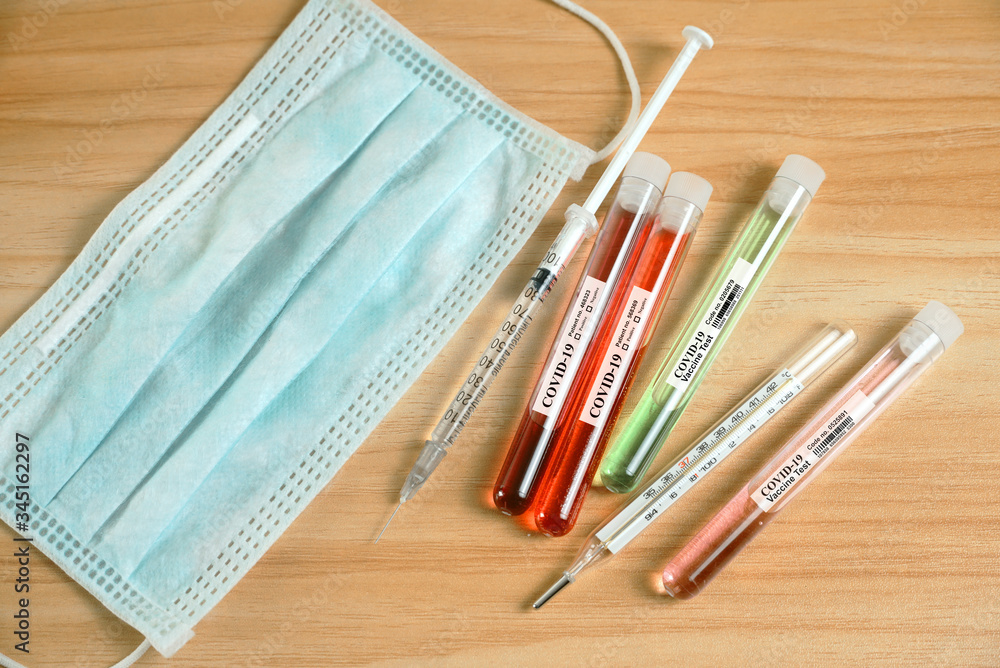 Covid-19 vaccine test and blood sample carry in tube glass decorate ...