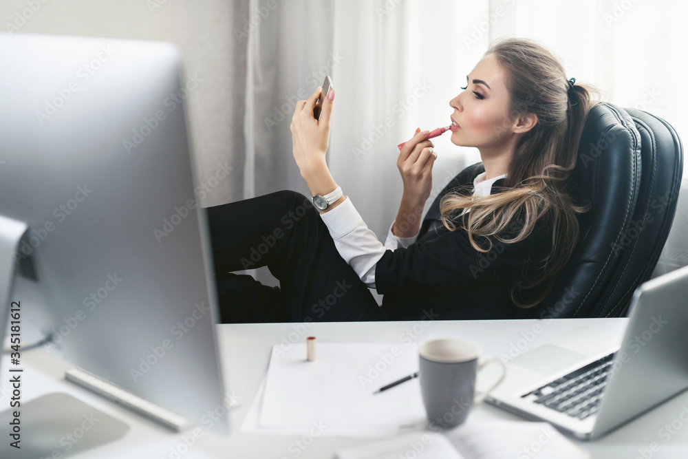 Foto de Tired lazy woman office worker loafing at workplace. Boring ...