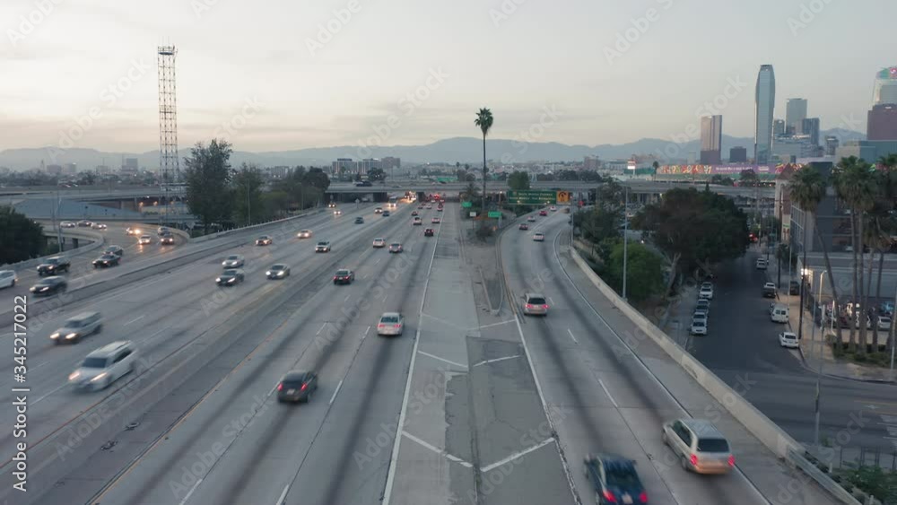 Los Angeles. Downtown. 2019. Early dusk over city highway. Lots of ...