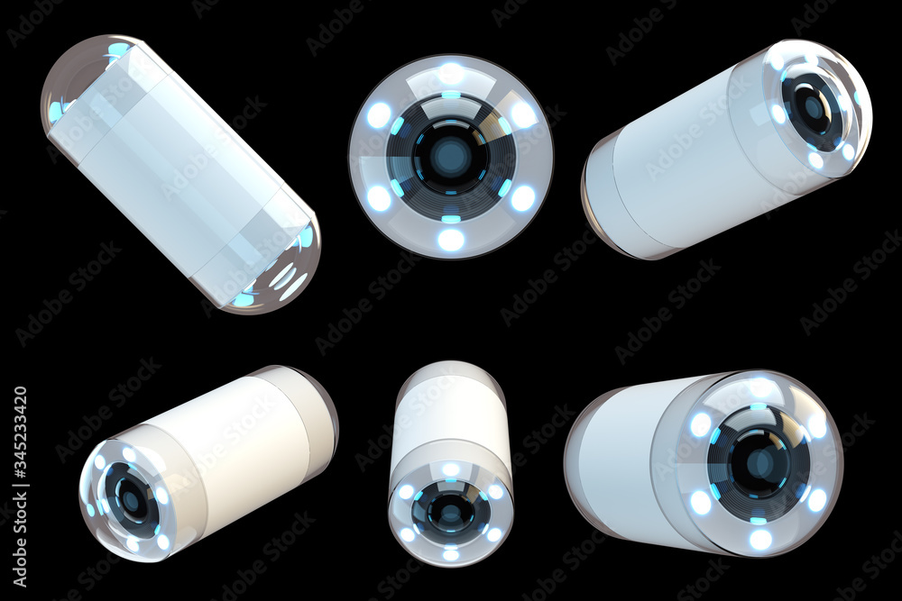 Capsule size camera for endoscopy isolated on black background. The ...