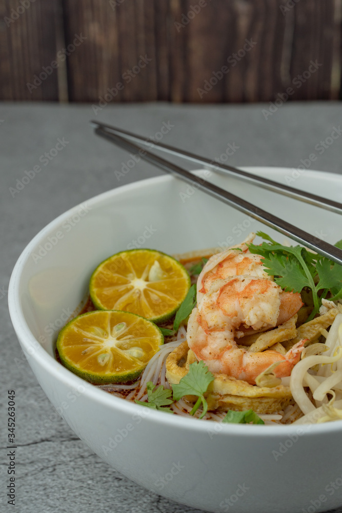"Laksa Sarawak" is local dish famous in Sarawak Malaysia. Serve in ...