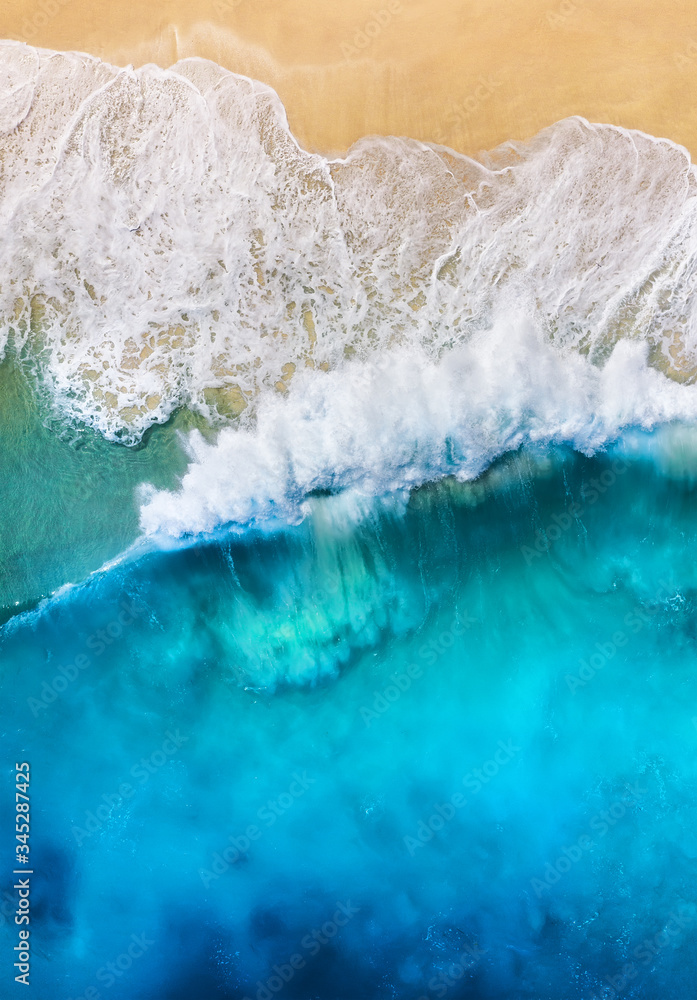 Coast with waves as a background from top view. Blue water background ...
