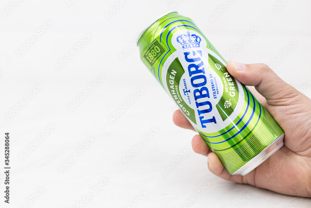 Belgrade, Serbia - 27. April 2020.: Tuborg beer can in the hand with ...