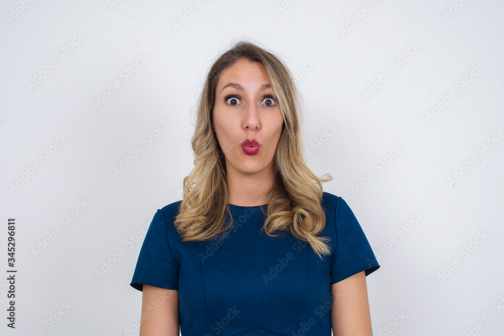 Headshot of goofy surprised bug-eyed young woman student wearing casual ...