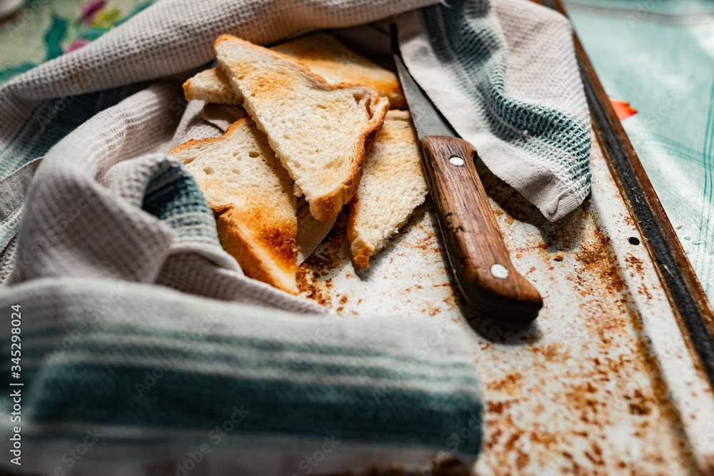 Triangular slices of toasted white bread with a soft texture inside and ...