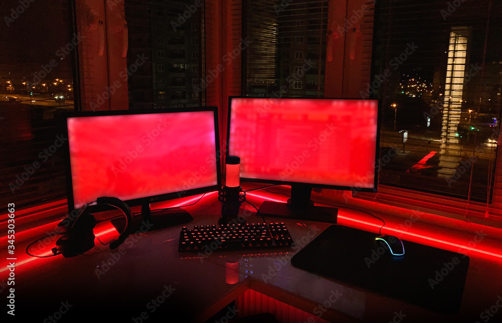 Dark room for a gamer with a computer table, neon lights. Gamezone ...